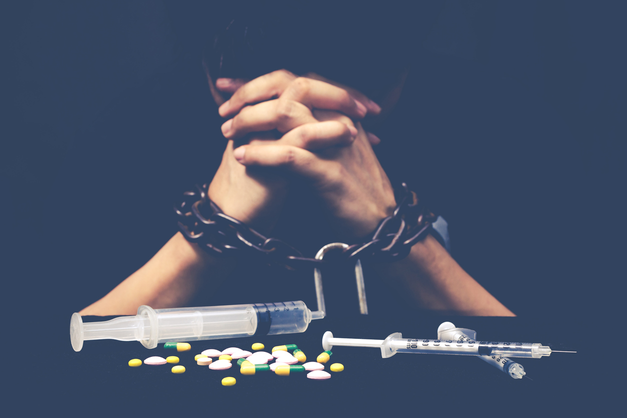 drug case prisoner with narcotic and syringe – Jeff Sandoz, Ph.D.
